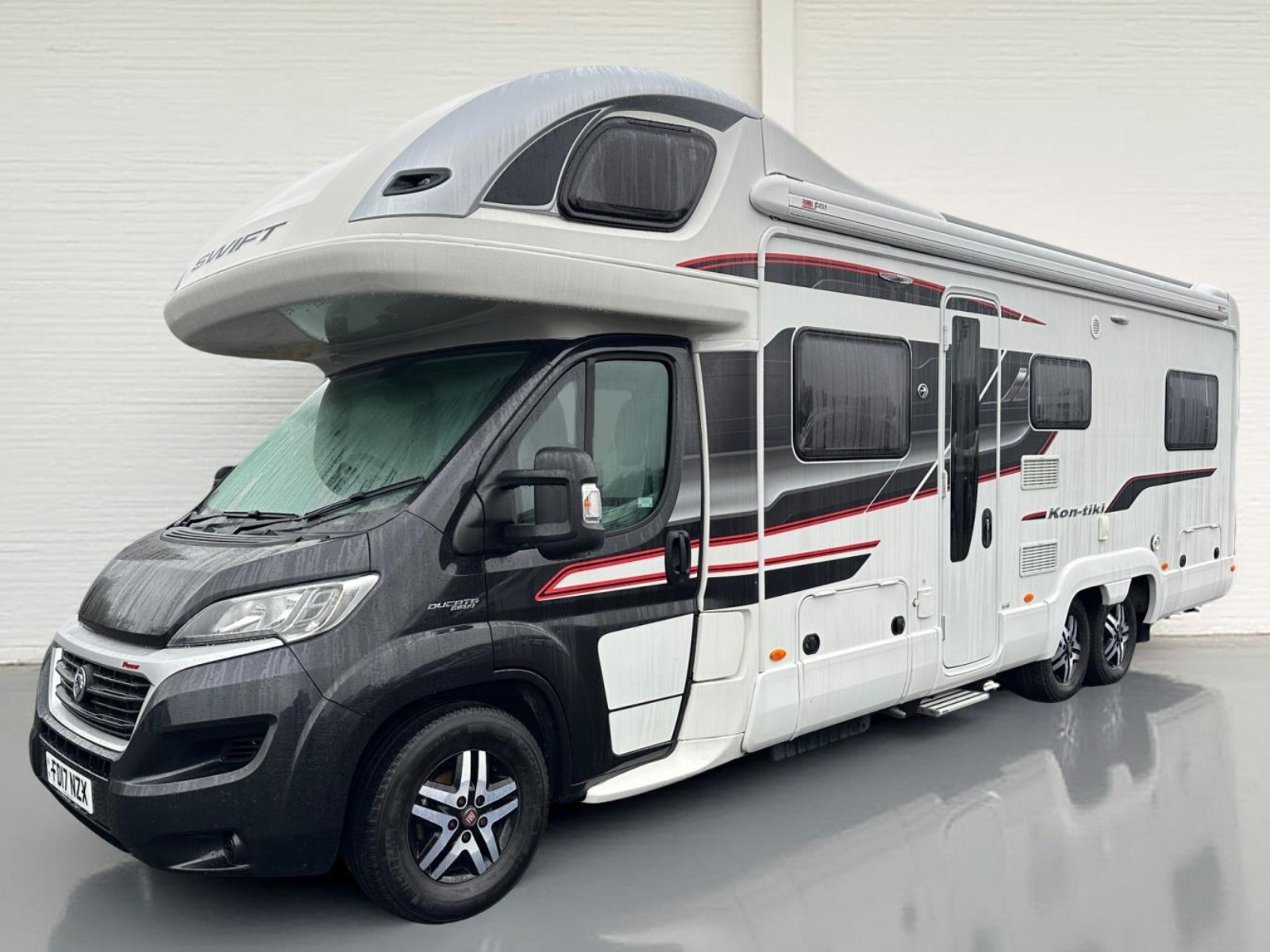 2017 Swift Kontiki 649 nearside external with awning and alloy wheels